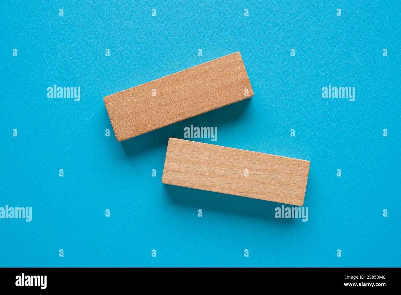 Blank wooden blocks on a blue background that can be written on Stock ...