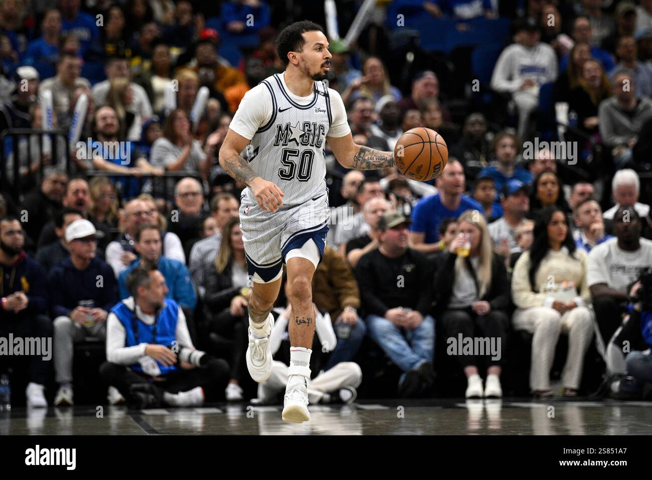 Orlando Magic guard Cole Anthony (50) brings the ball up the court ...