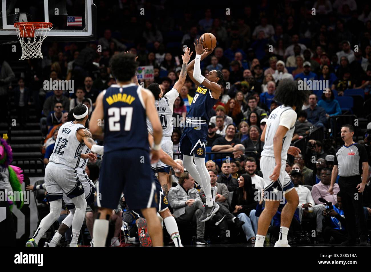 Denver Nuggets forward Peyton Watson (8) shoots in front of Orlando ...