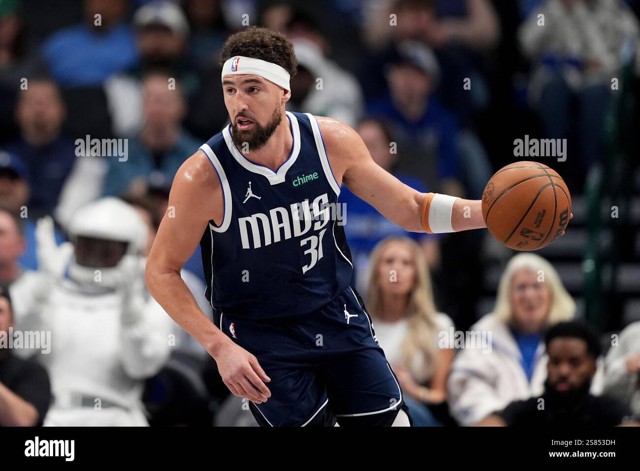 Dallas Mavericks guard Klay Thompson works against the Denver Nuggets ...