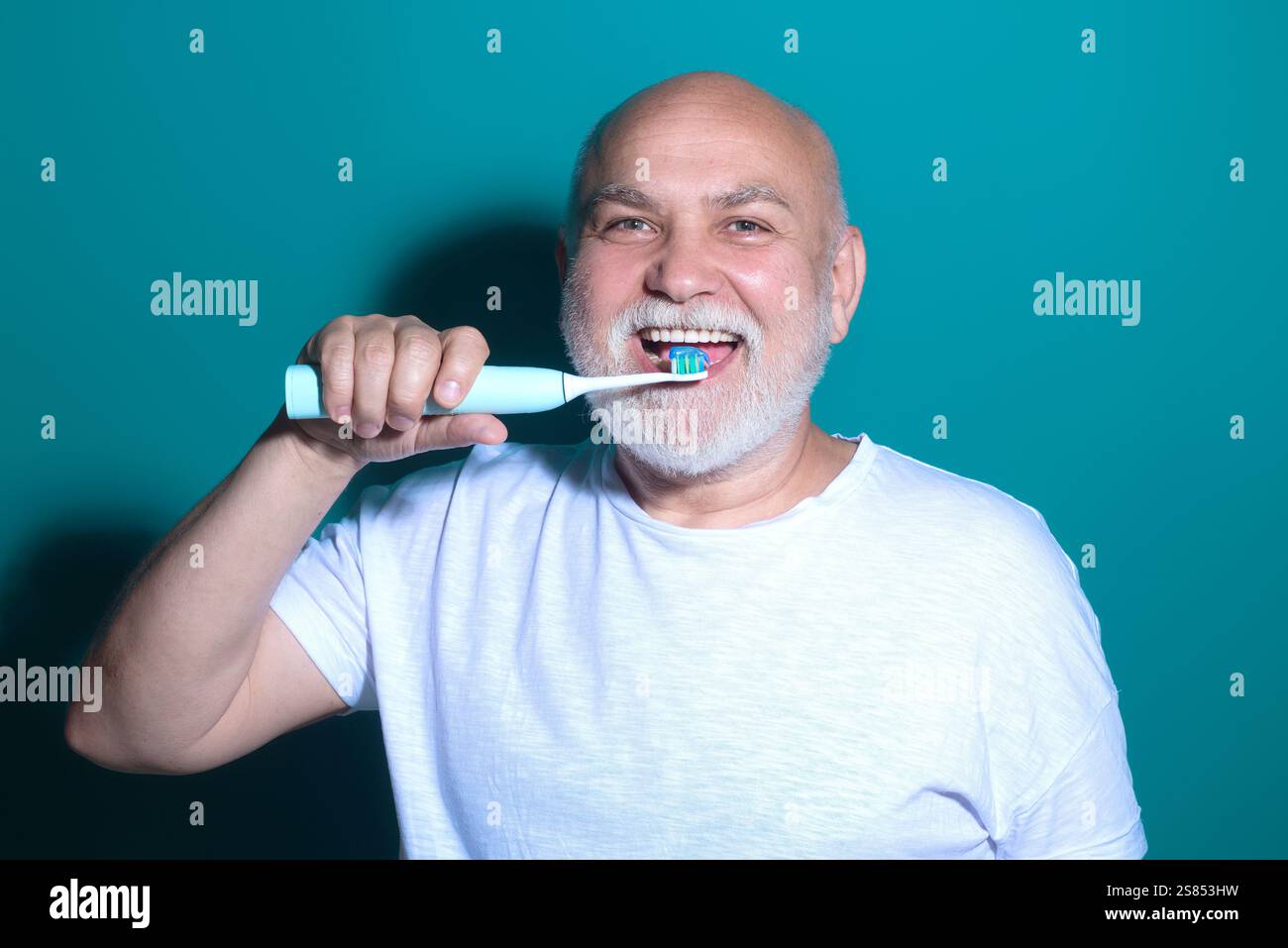 Brushing teeth. Senior holding toothbrush for tooth brushing. Dentistry ...