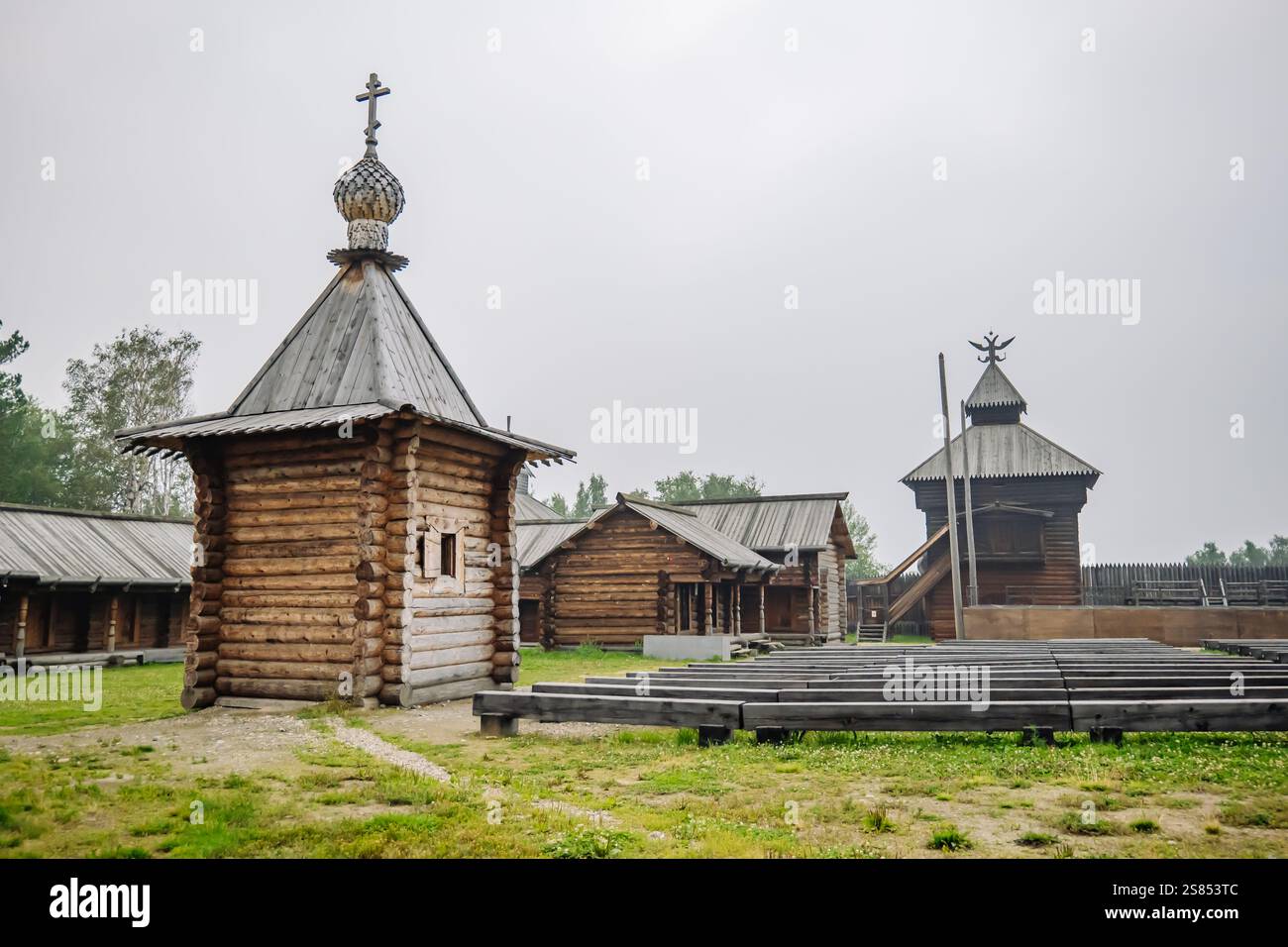 Wooden russian chapel nestled among historic fortified structures ...