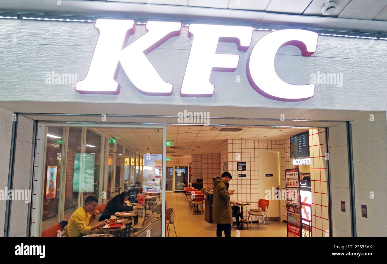 SHANGHAI, CHINA - JANUARY 14, 2025 - Customers spend money at a newly opened KFC outlet on a ...
