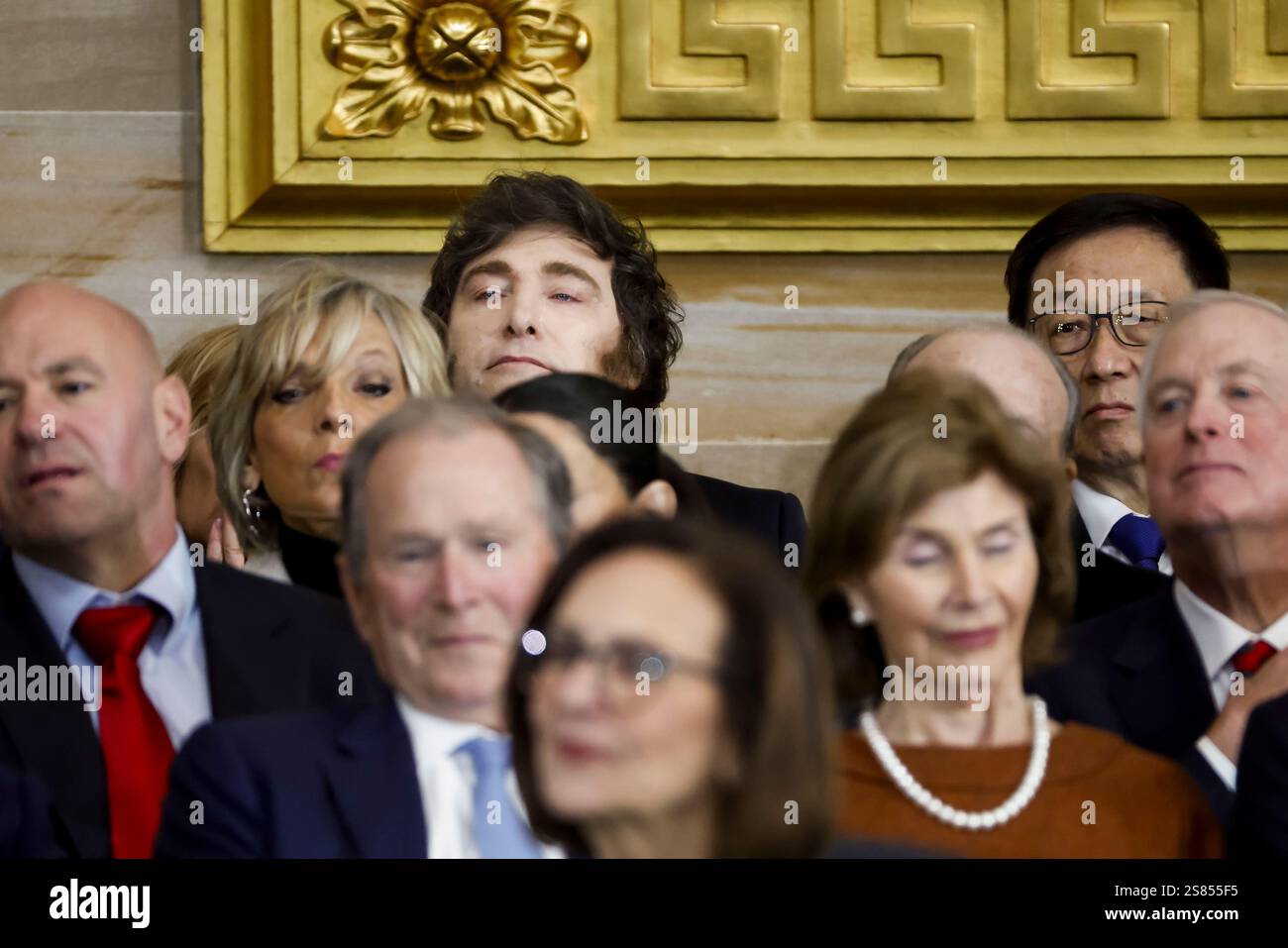 Argentina’s President Javier Milei (3-L) listens during US President ...