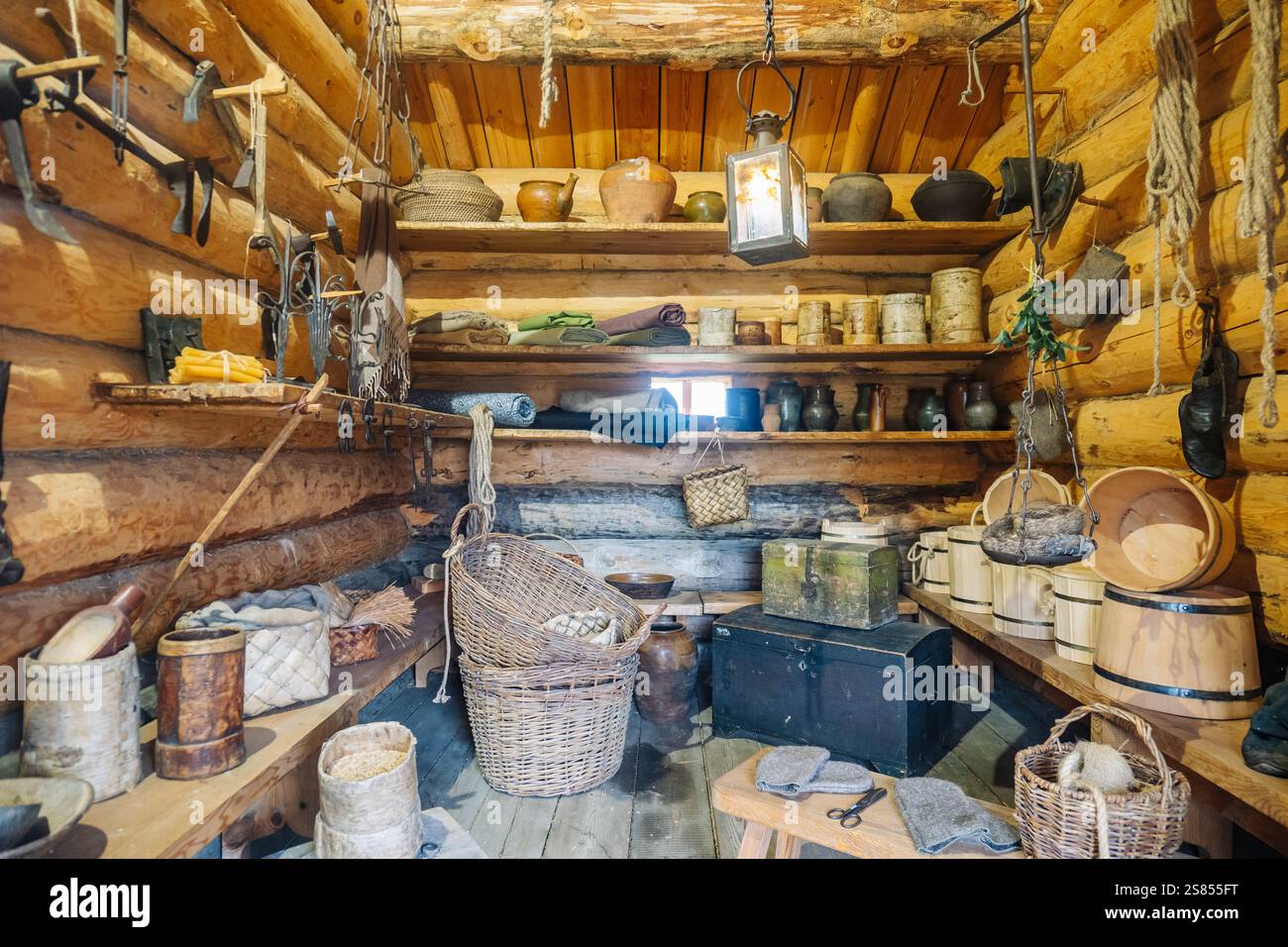 Ancient russian wooden house interior displaying various vintage tools ...