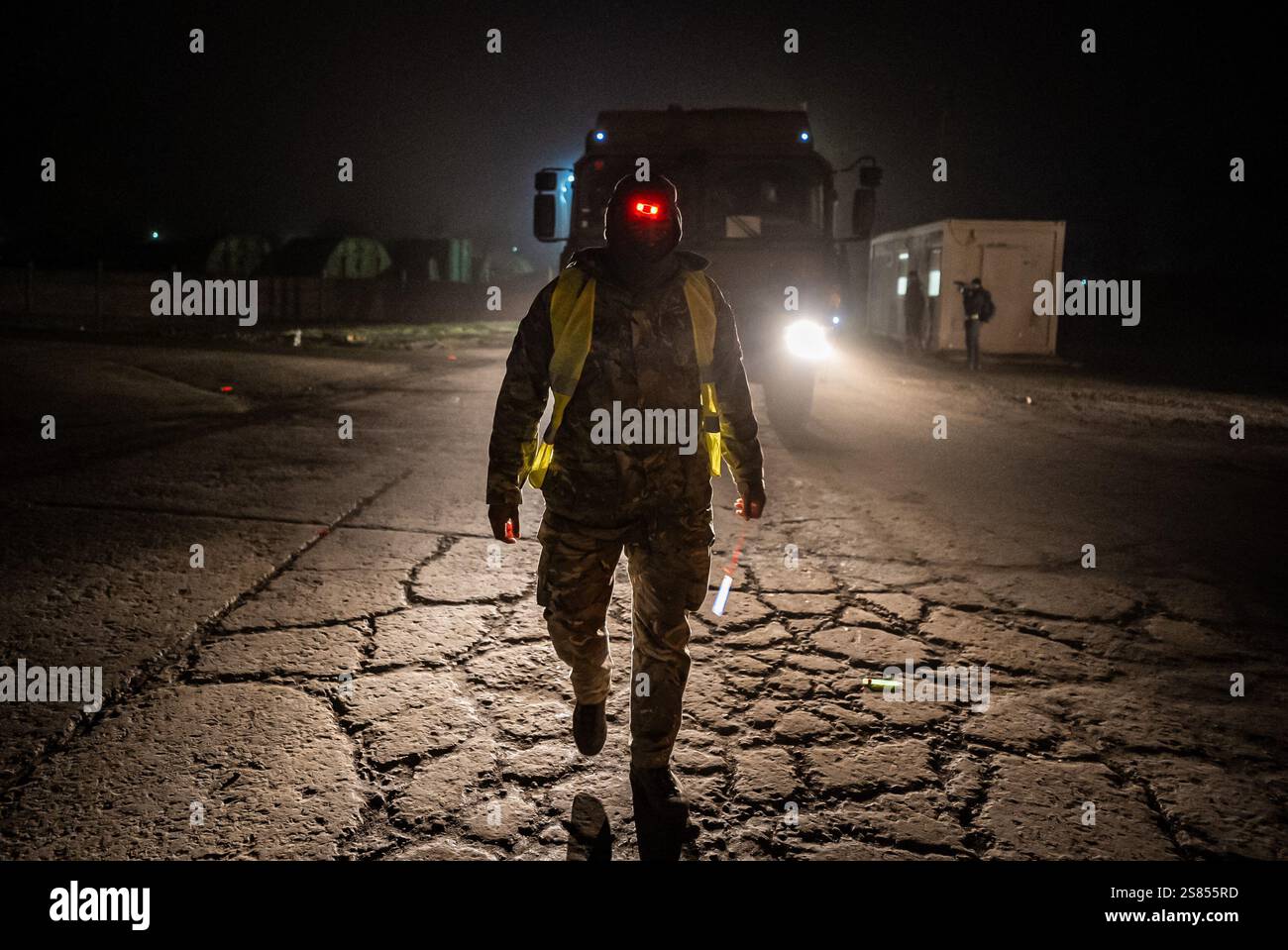 British military vehicles are marshalled as they arrive at a Hungarian ...