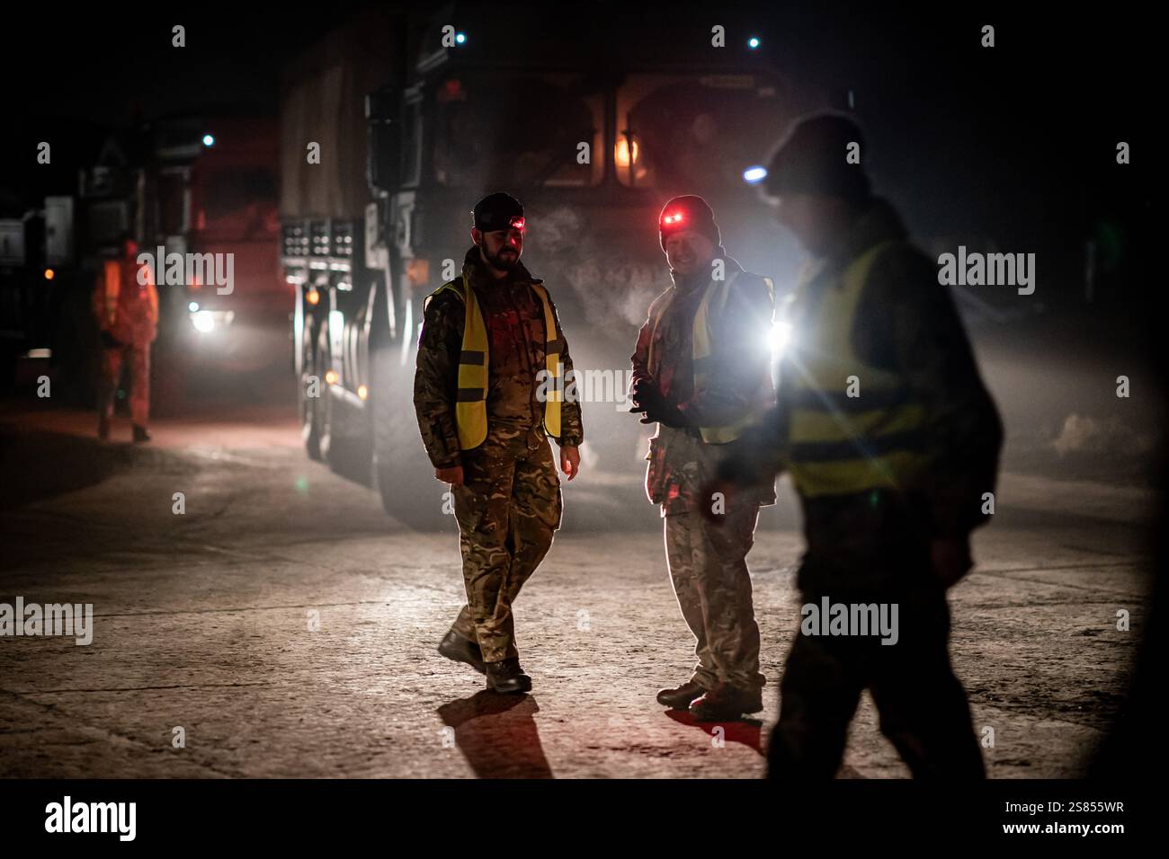 British military vehicles are marshalled as they arrive at a Hungarian ...
