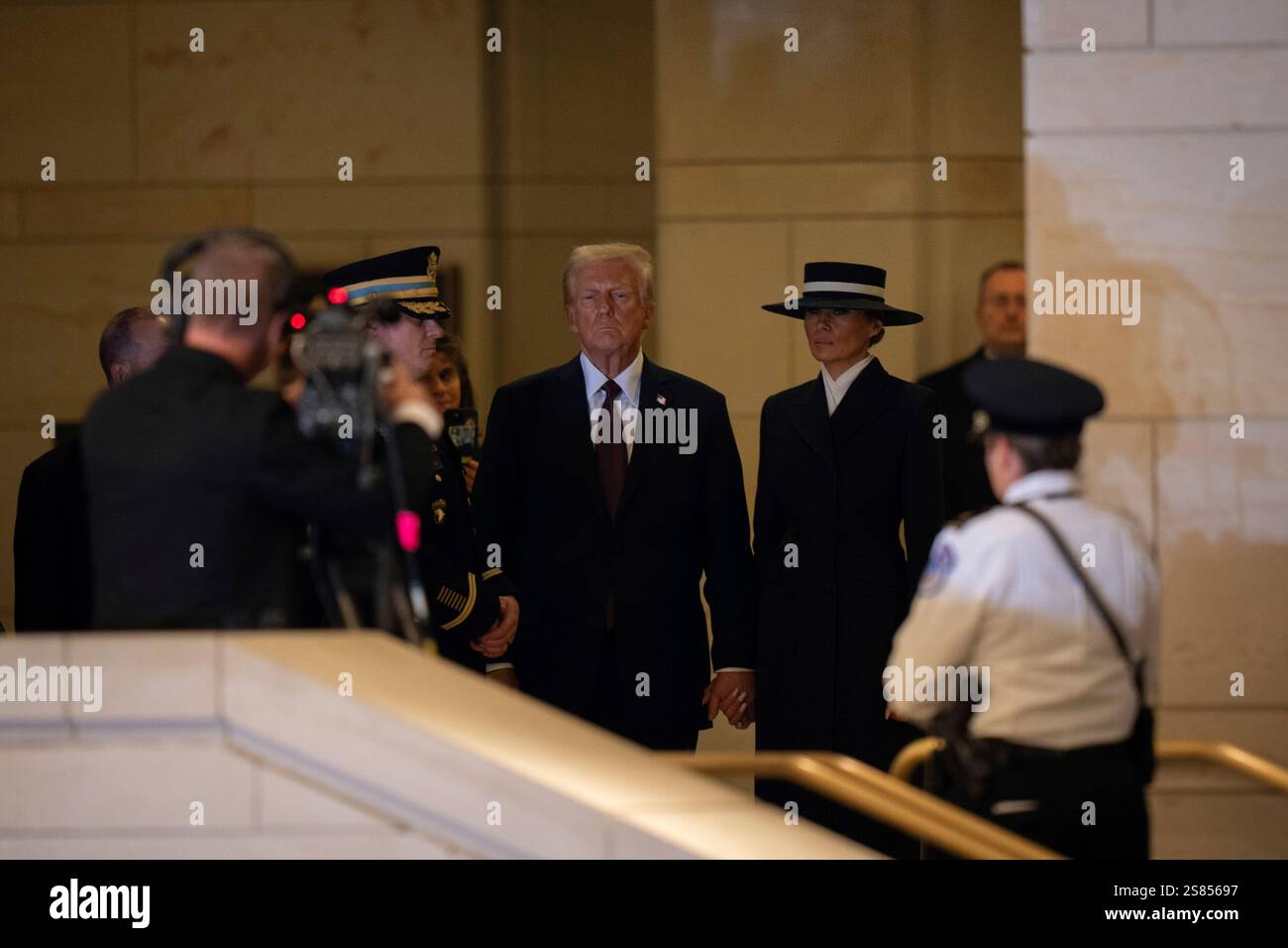 President Donald Trump and First Lady Melania Trump arrive for a review ...