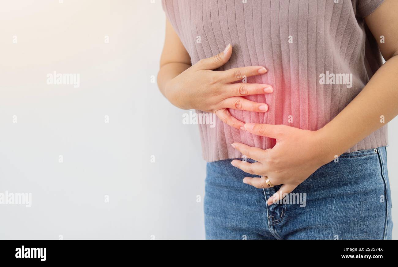 Flatulence woman hand in stomach ache, suffer from food poisoning ...