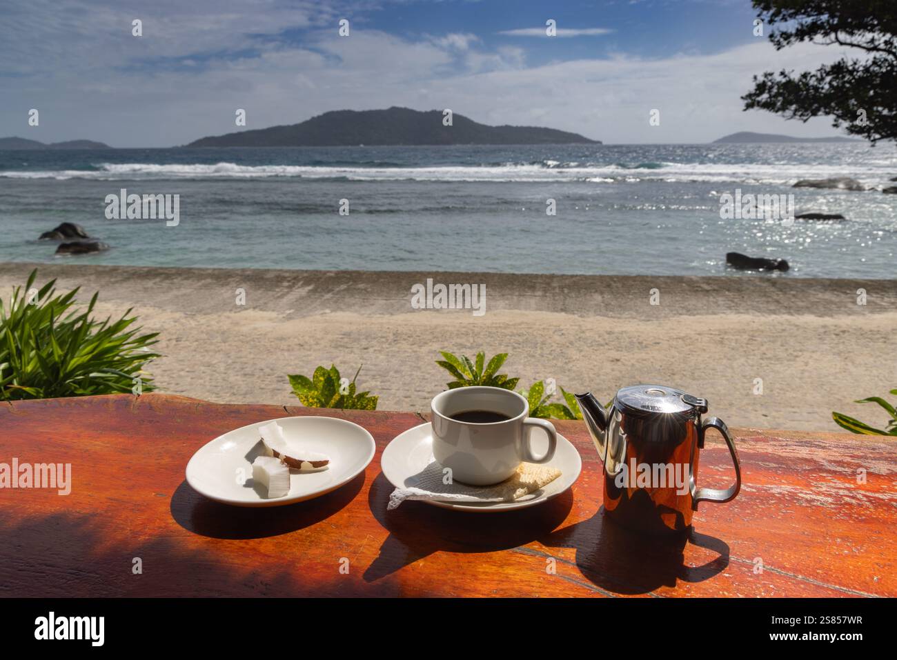 Cup of coffee with some coconut in an outside bar with a view on La ...