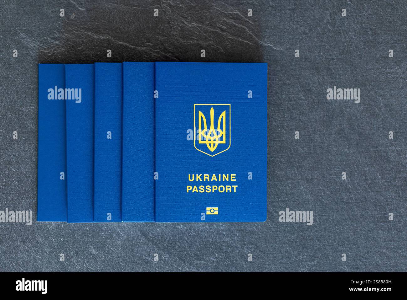 Ukraine passports stacked. Ukrainian biometric passport. Emigration ...