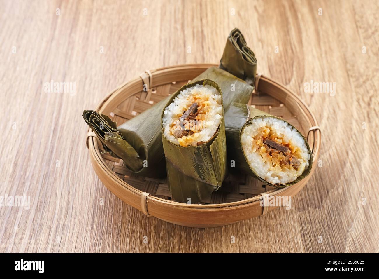 Arem-arem, a traditional Indonesian food made from rice filled with ...