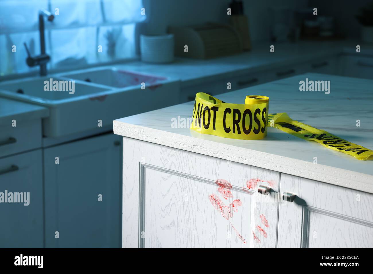 Yellow crime scene tape and bloody handprint on chest of drawers in ...