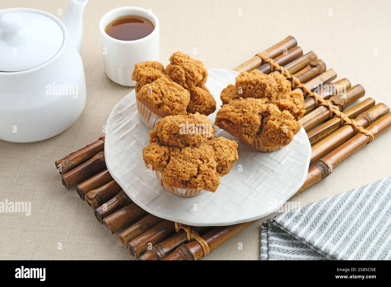 Bolu Kukus Gula Jawa (brown sugar steamed sponge cake), a traditional ...