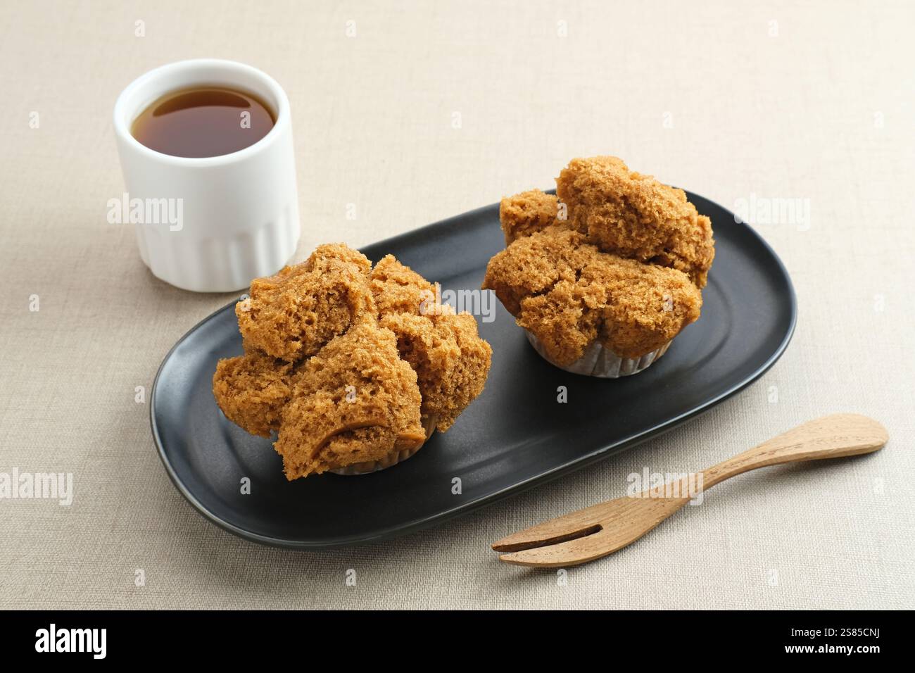 Bolu Kukus Gula Jawa (brown sugar steamed sponge cake), a traditional ...