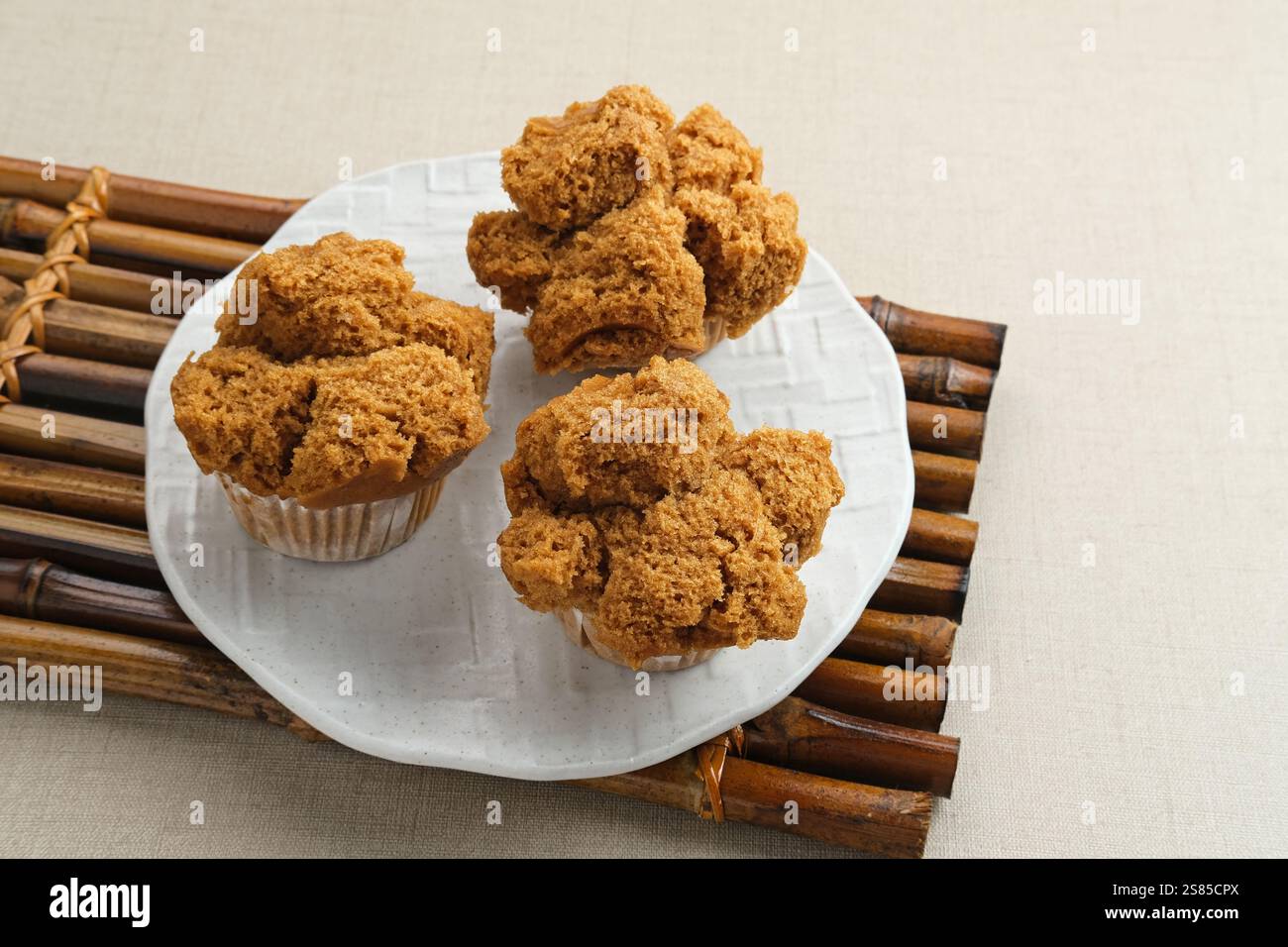 Bolu Kukus Gula Jawa (brown sugar steamed sponge cake), a traditional ...