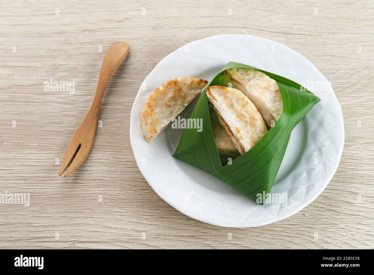Kue Pancong, Gandos or Bandros is an Indonesian traditional snack made ...