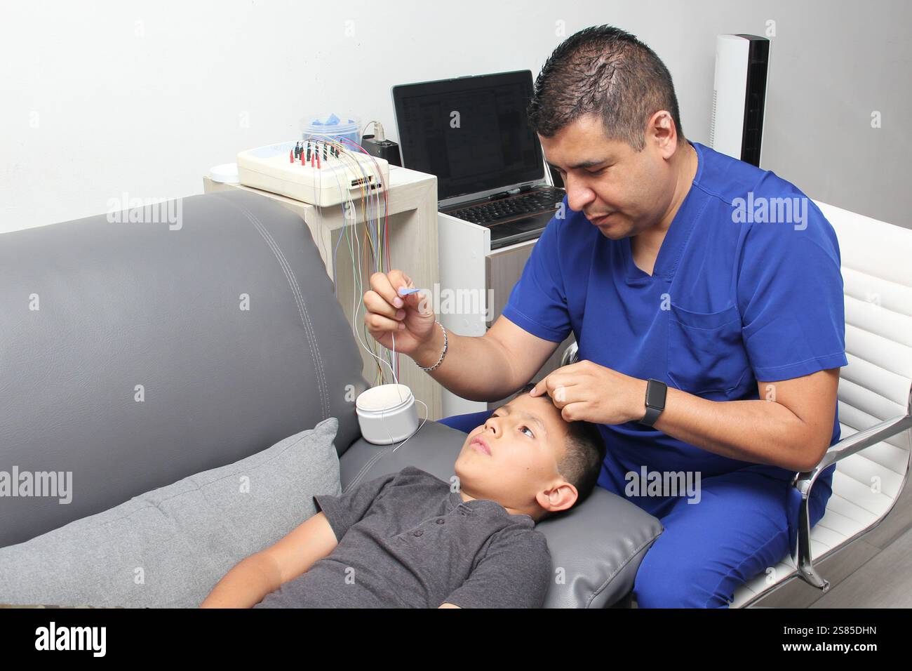 EEG electroencephalogram to record the electrical activity of the brain ...