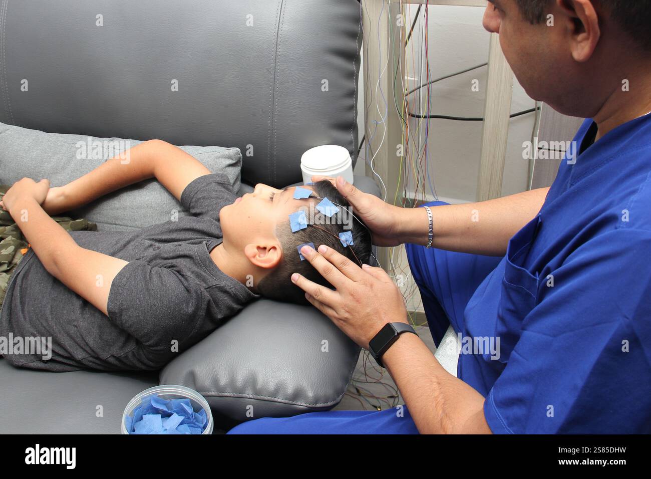 EEG electroencephalogram to record the electrical activity of the brain ...