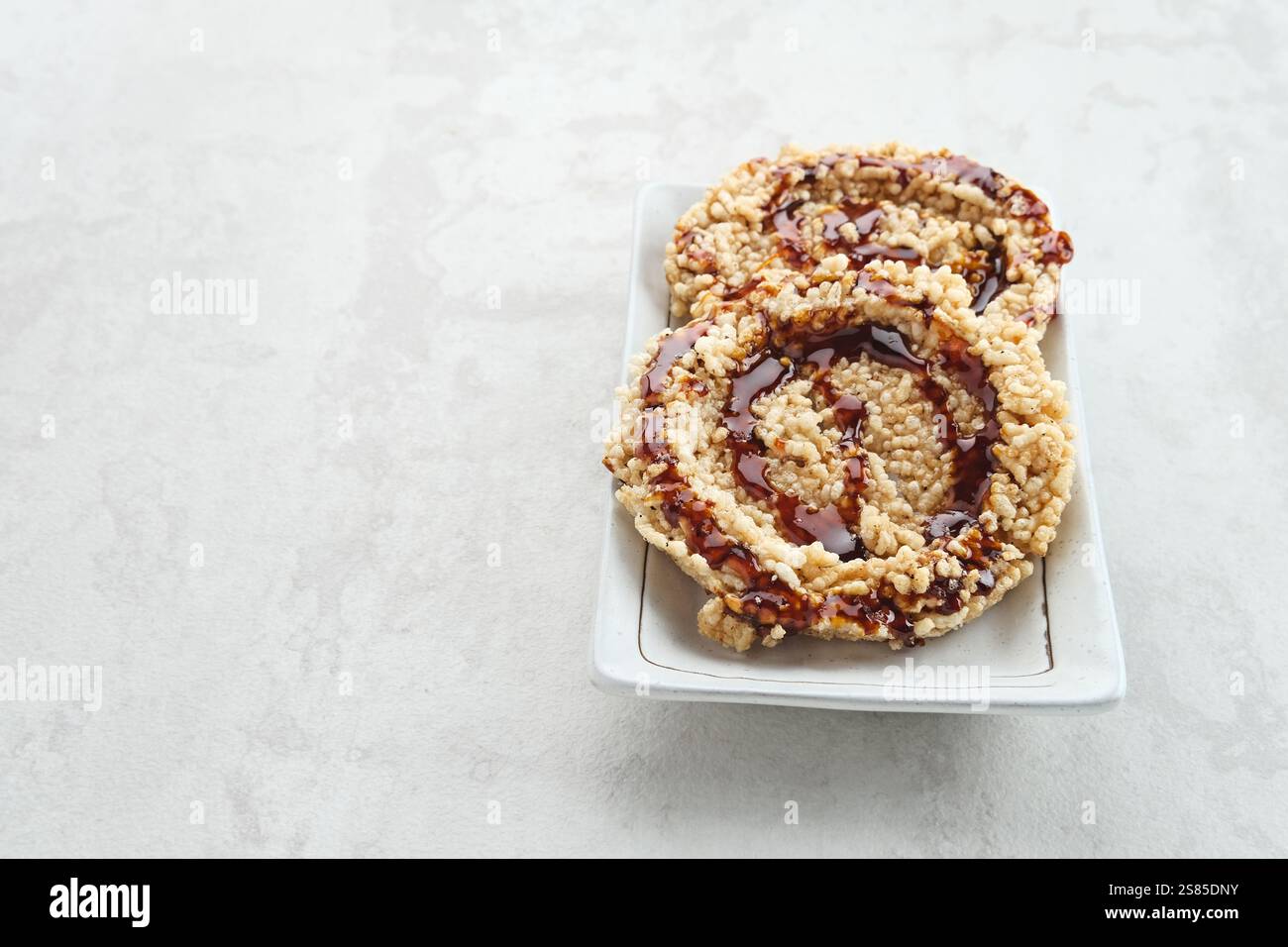 Intip Nasi (Rice Crackers) Indonesian traditional snack Stock Photo - Alamy