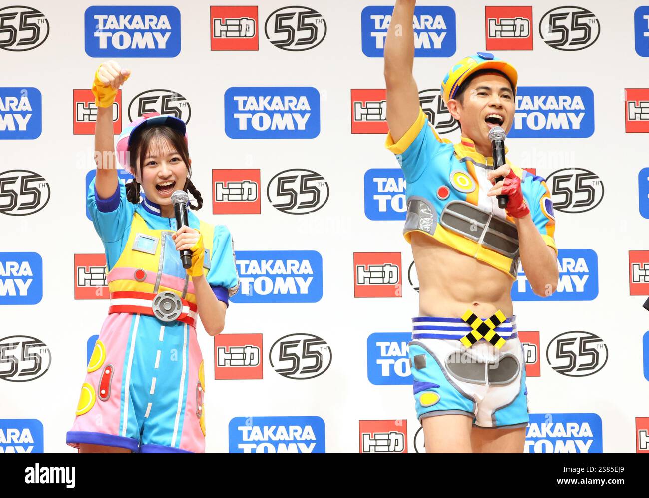 Tokyo, Japan. 21st Jan, 2025. Japanese comedian Yoshio Kojima (R) and model Wakana Sato (L) pose ...