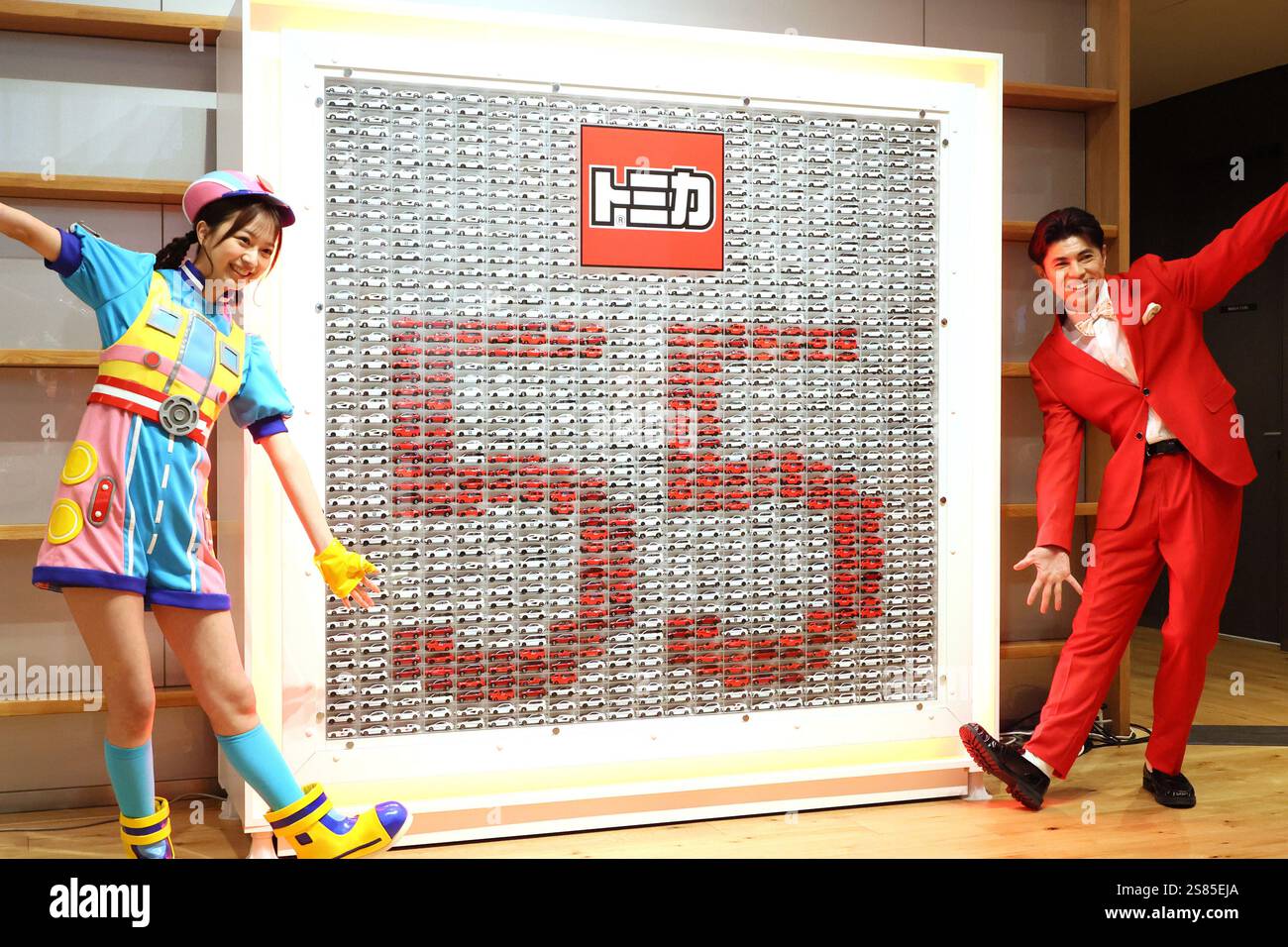 Tokyo, Japan. 21st Jan, 2025. Japanese comedian Yoshio Kojima (R) and model Wakana Sato (L) pose ...