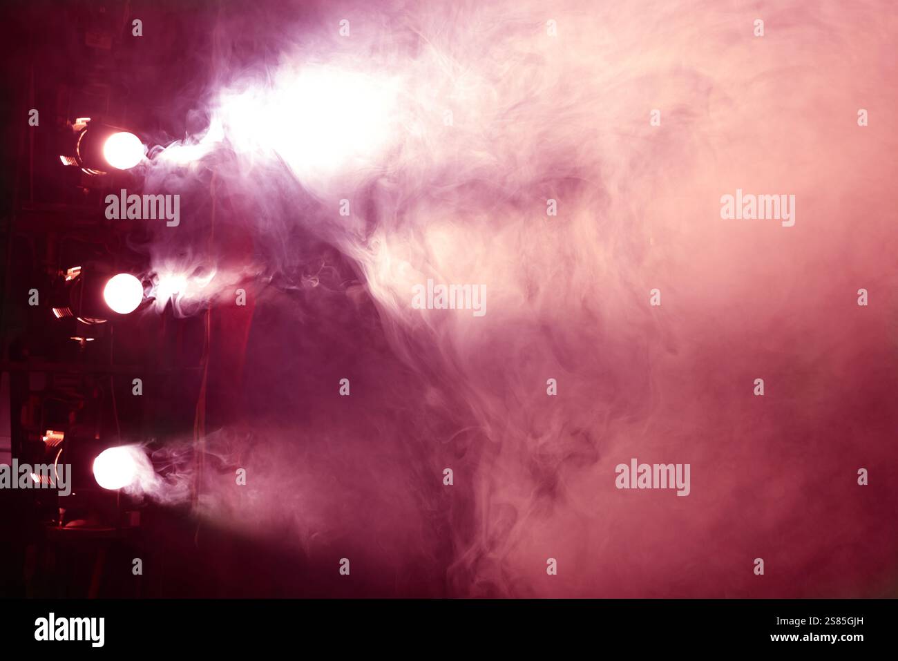 Professional spotlights and smoke on stage in theatre Stock Photo - Alamy