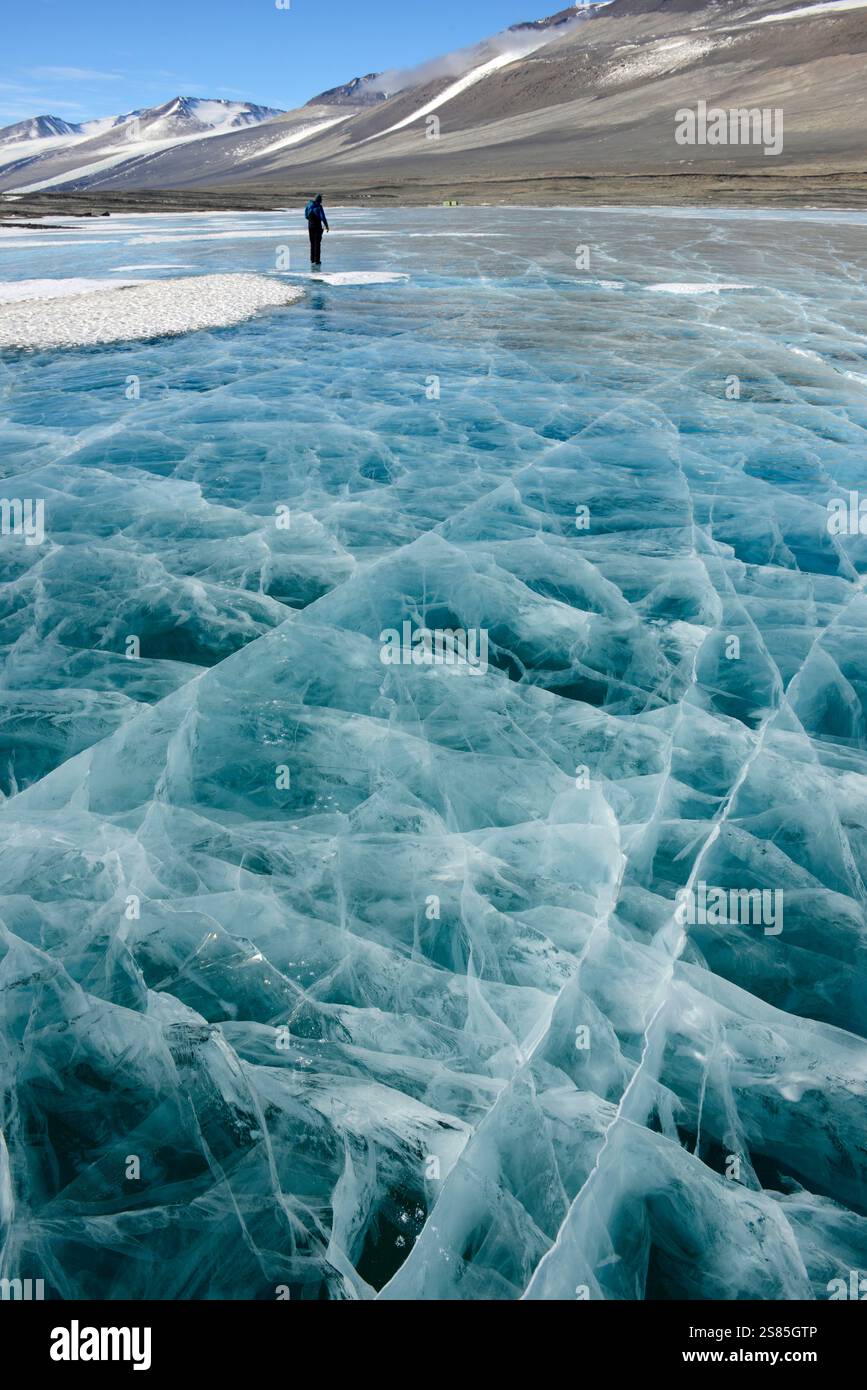 The pure clear ice covering Lake Vanda, Wright Valley, is more than ...