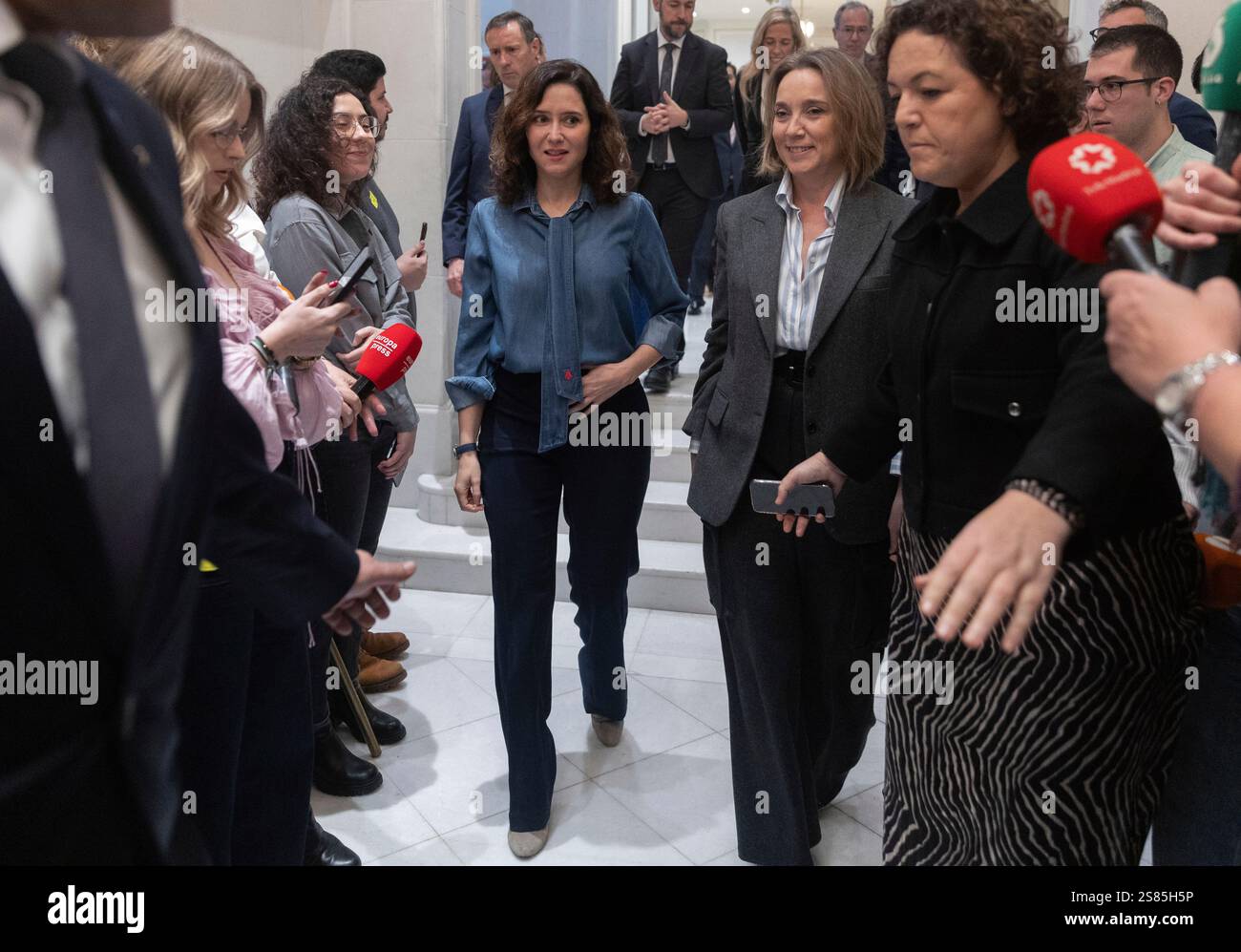 The president of the Community of Madrid, Isabel Díaz Ayuso (left) and ...