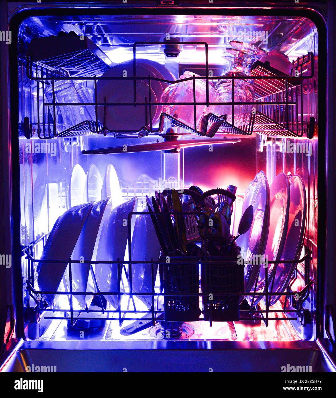 Detail of the interior of a stainless steel dishwasher with two wire ...