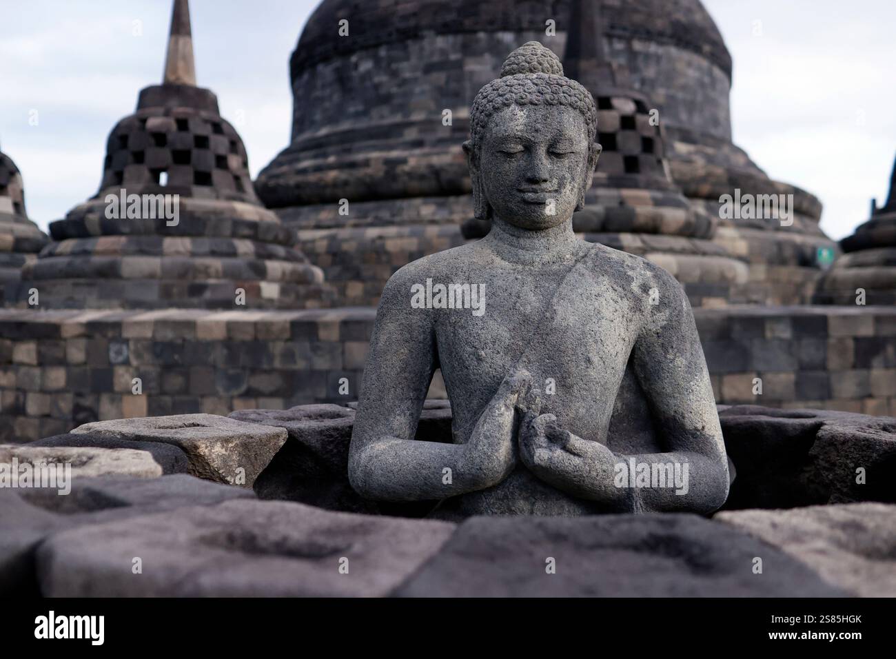 Stone Buddha statue, Borobudur, 9th-century Mahayana Buddhist temple ...