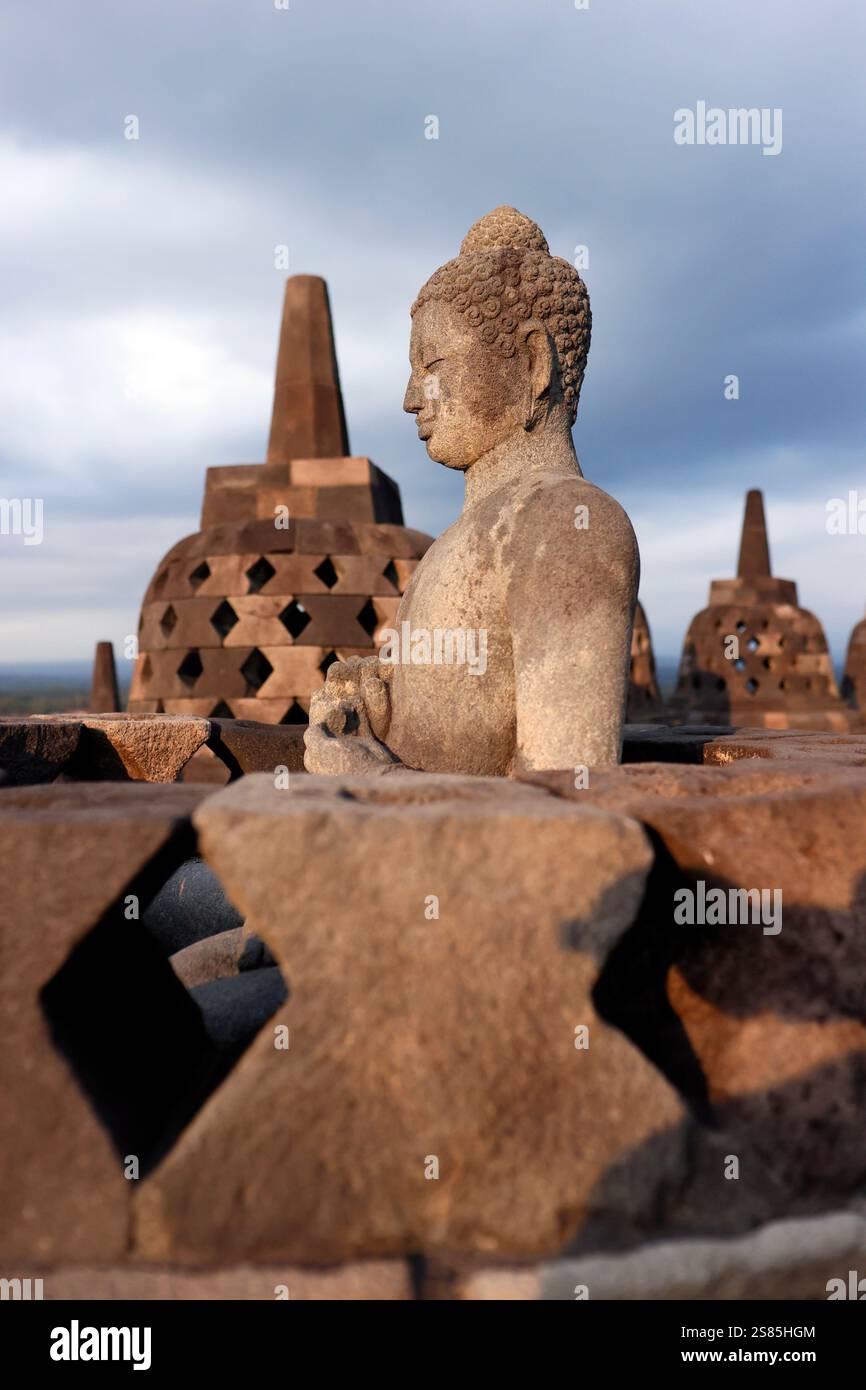 Stone Buddha statue, Borobudur, 9th-century Mahayana Buddhist temple ...