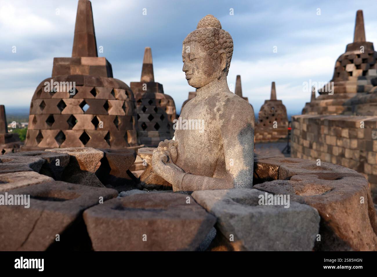 Stone Buddha statue, Borobudur, 9th-century Mahayana Buddhist temple ...