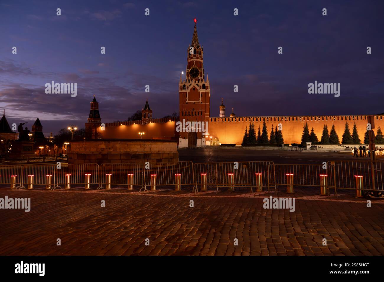 The Kremlin Wall, the Spasskaya Tower and empty Red Square are seen in ...