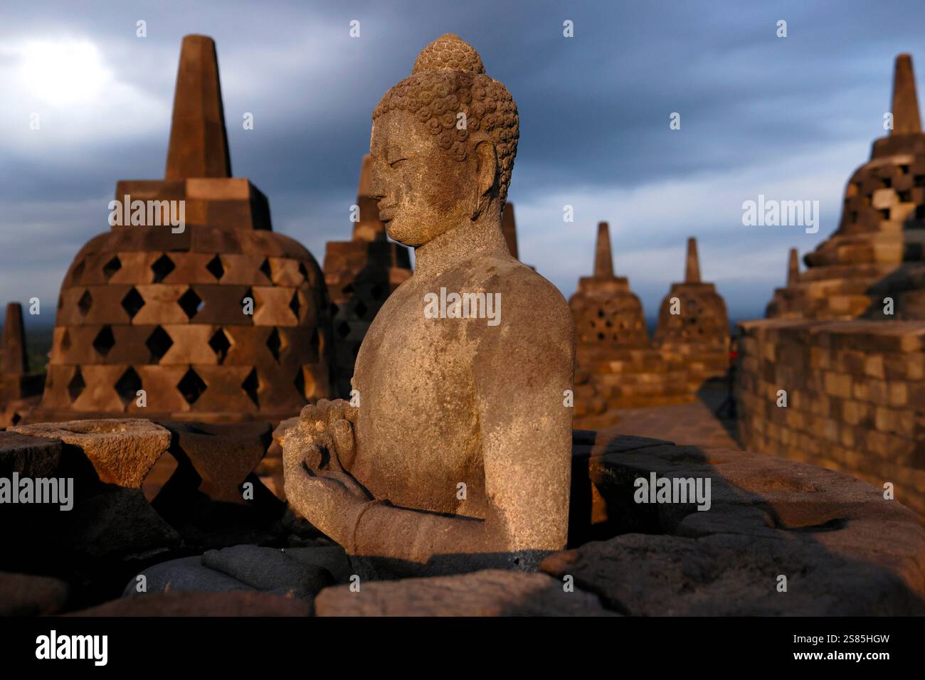 Stone Buddha statue, Borobudur, 9th-century Mahayana Buddhist temple ...