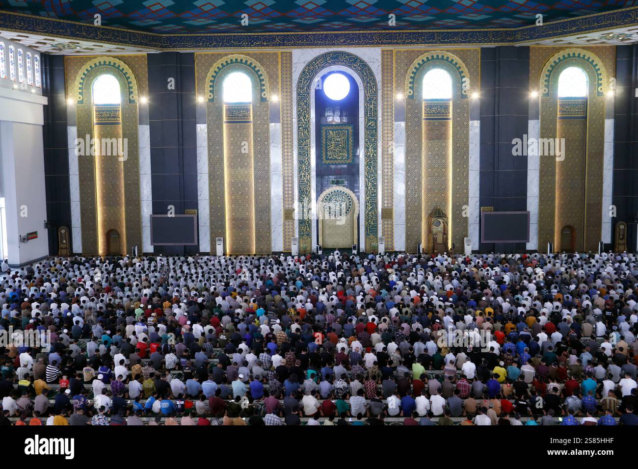 Al Akbar Surabaya National Mosque, Muslim men praying together at ...