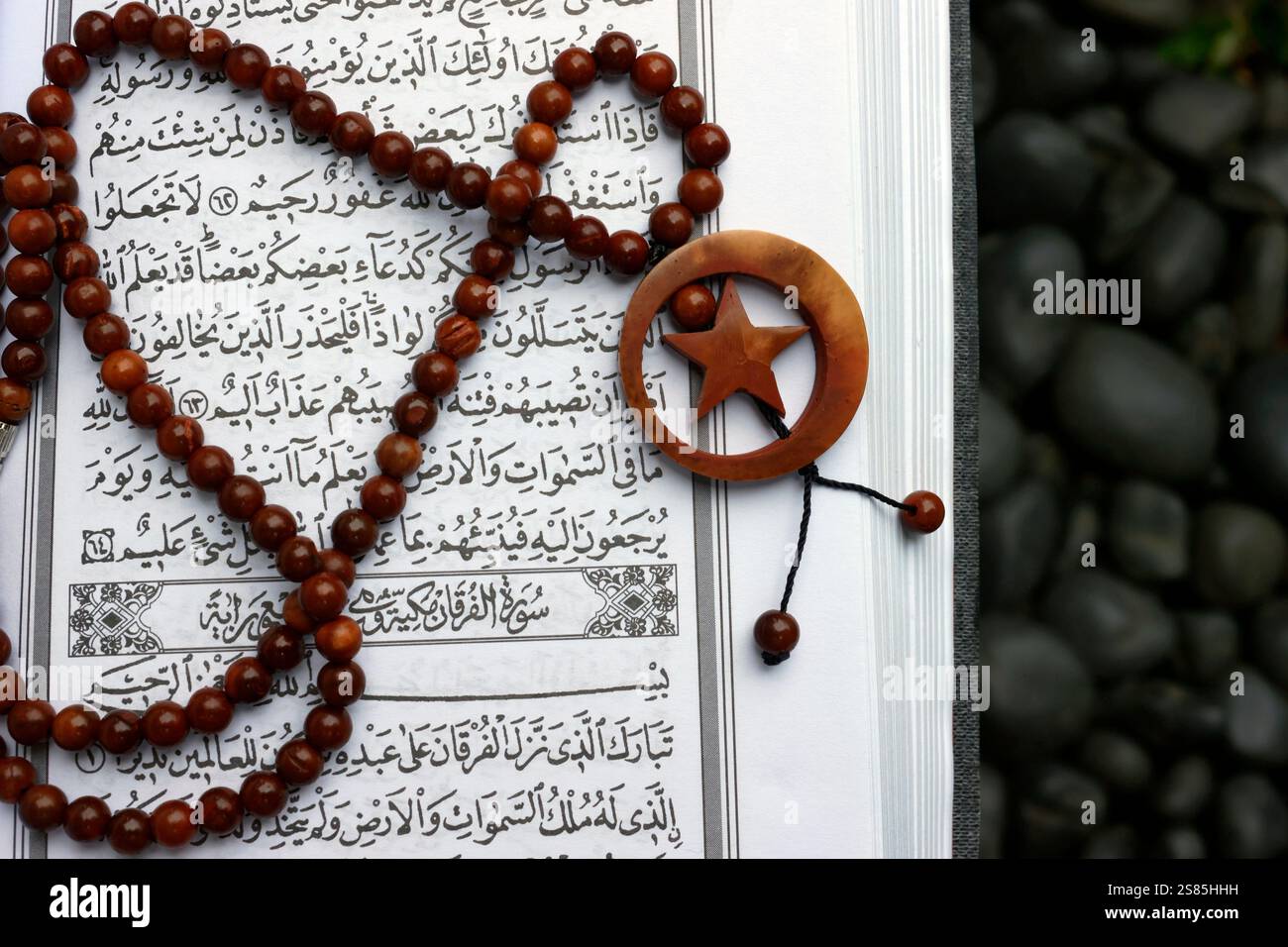 Islamic Holy Book Quran with rosary beads, Ramadan concept, Indonesia ...