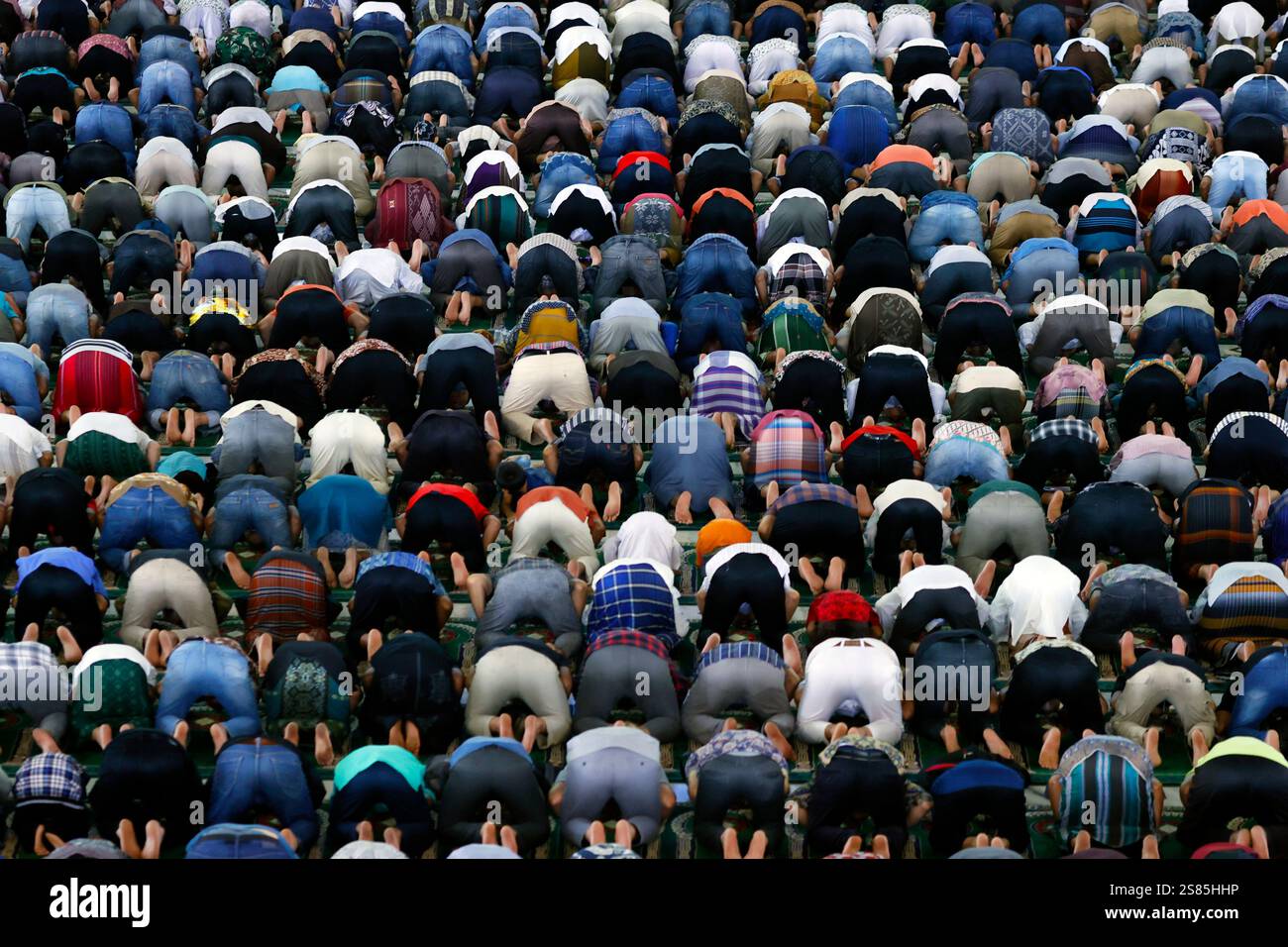 Al Akbar Surabaya National Mosque, Muslim men praying together at ...