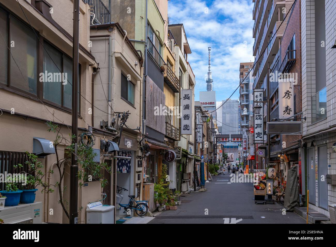 Colourful shops and buildings with Tokyo Skytree in background, Asakusa ...
