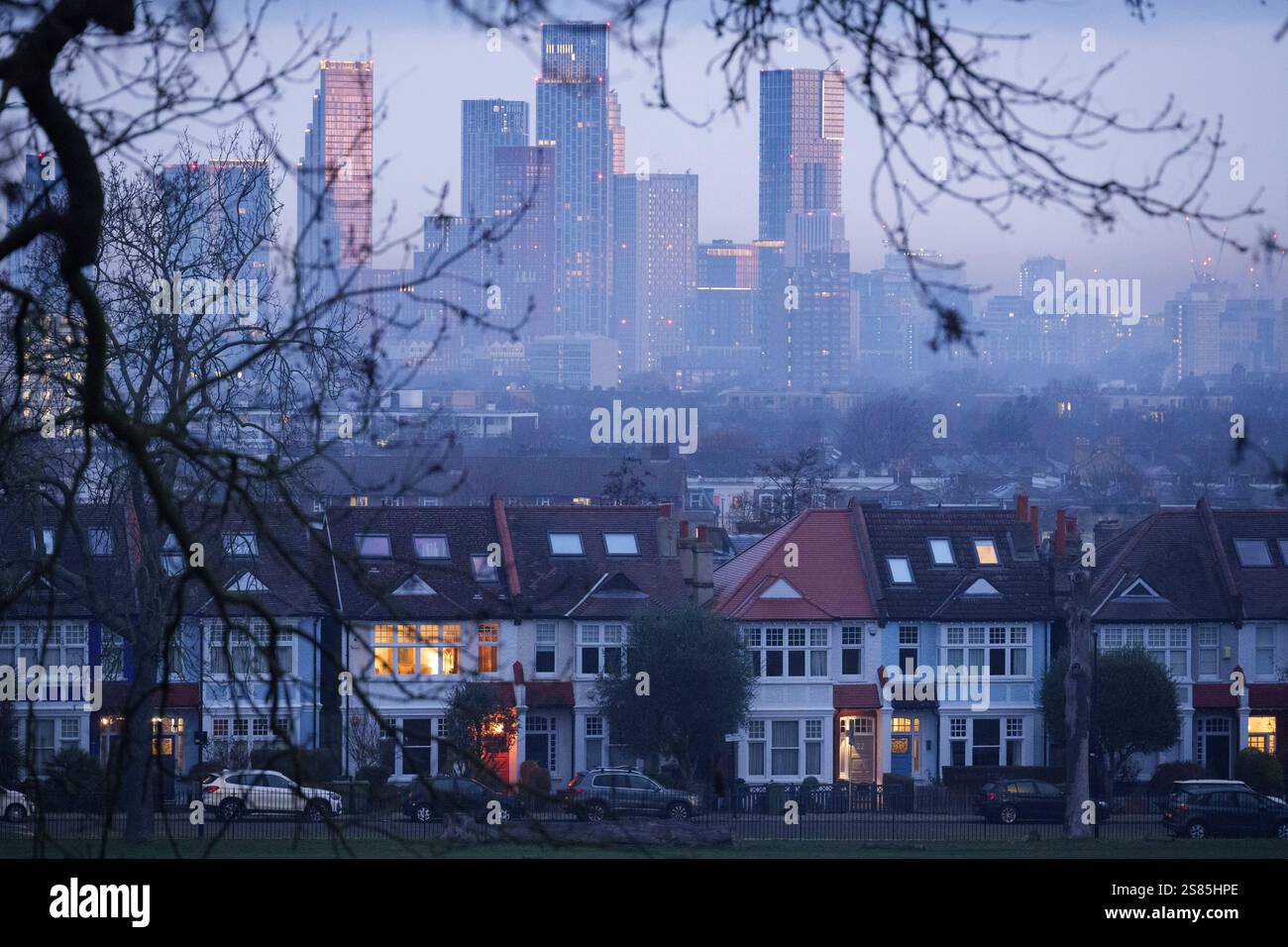Seen through the branches of trees in Ruskin Park are the dawn windows ...