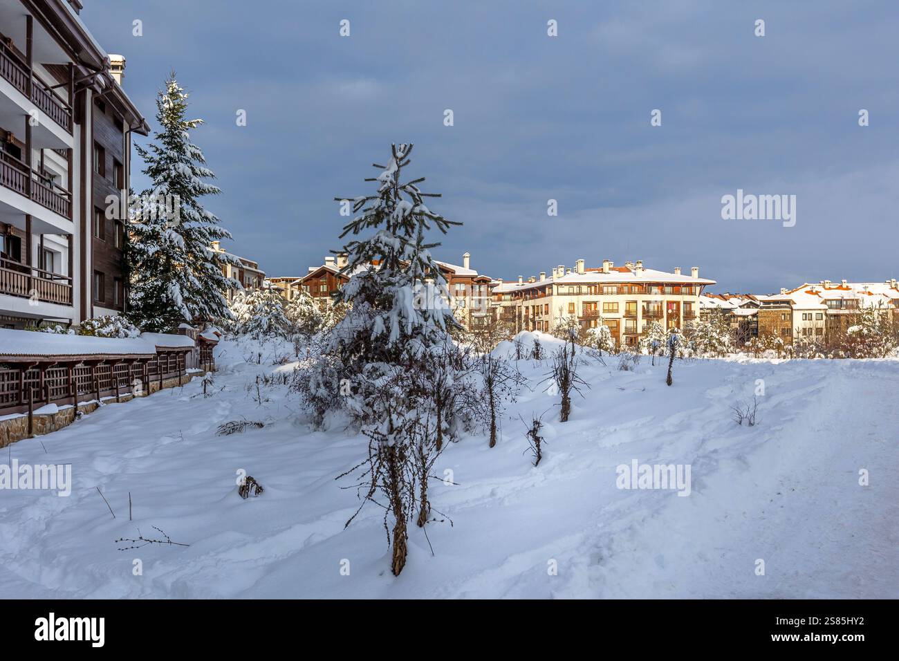 Bansko, Bulgaria winter street view, houses and Pirin snow mountain ...