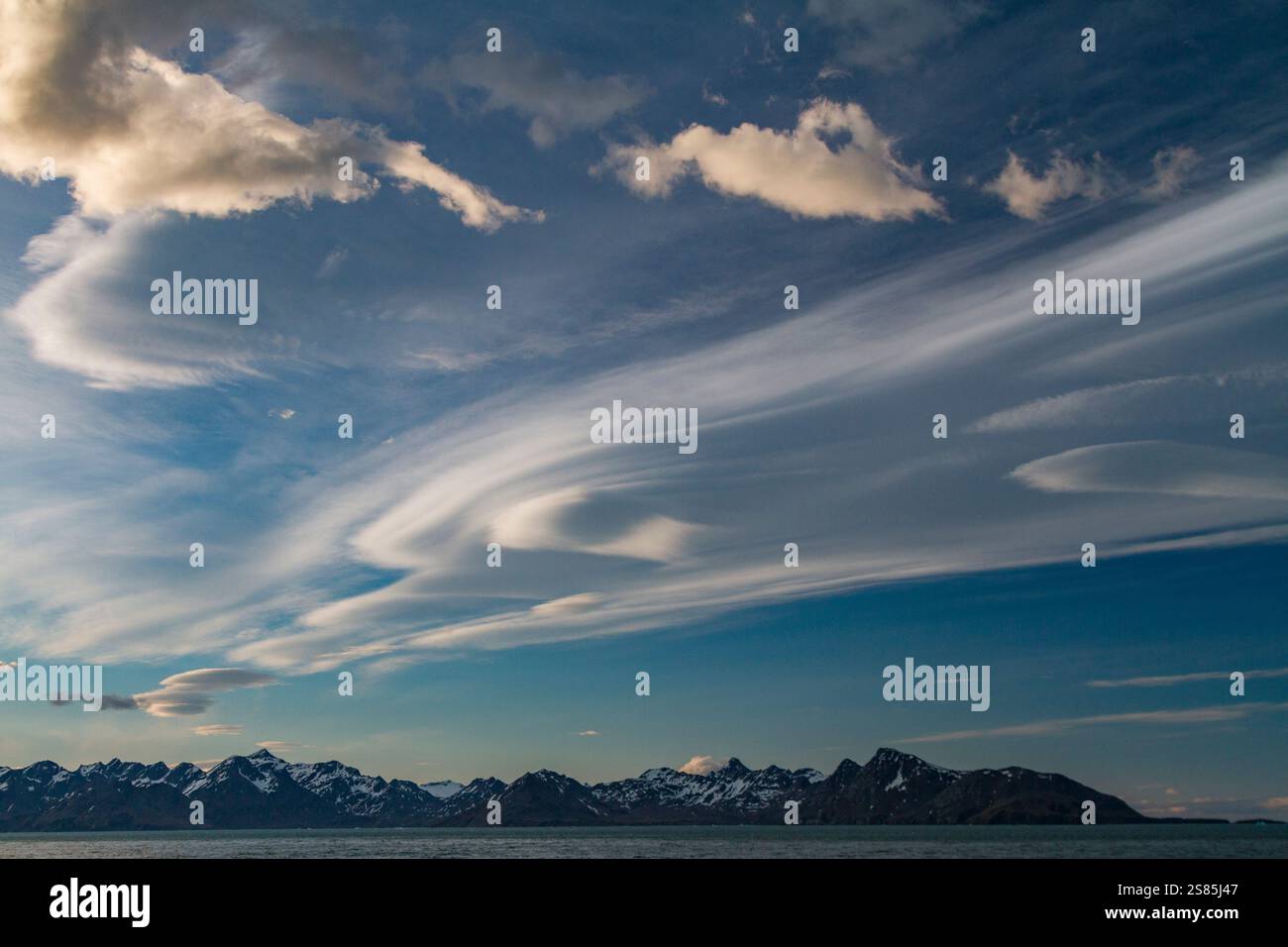 Interesting lenticular cloud formations forming over the island of South Georgia in the Southern ...