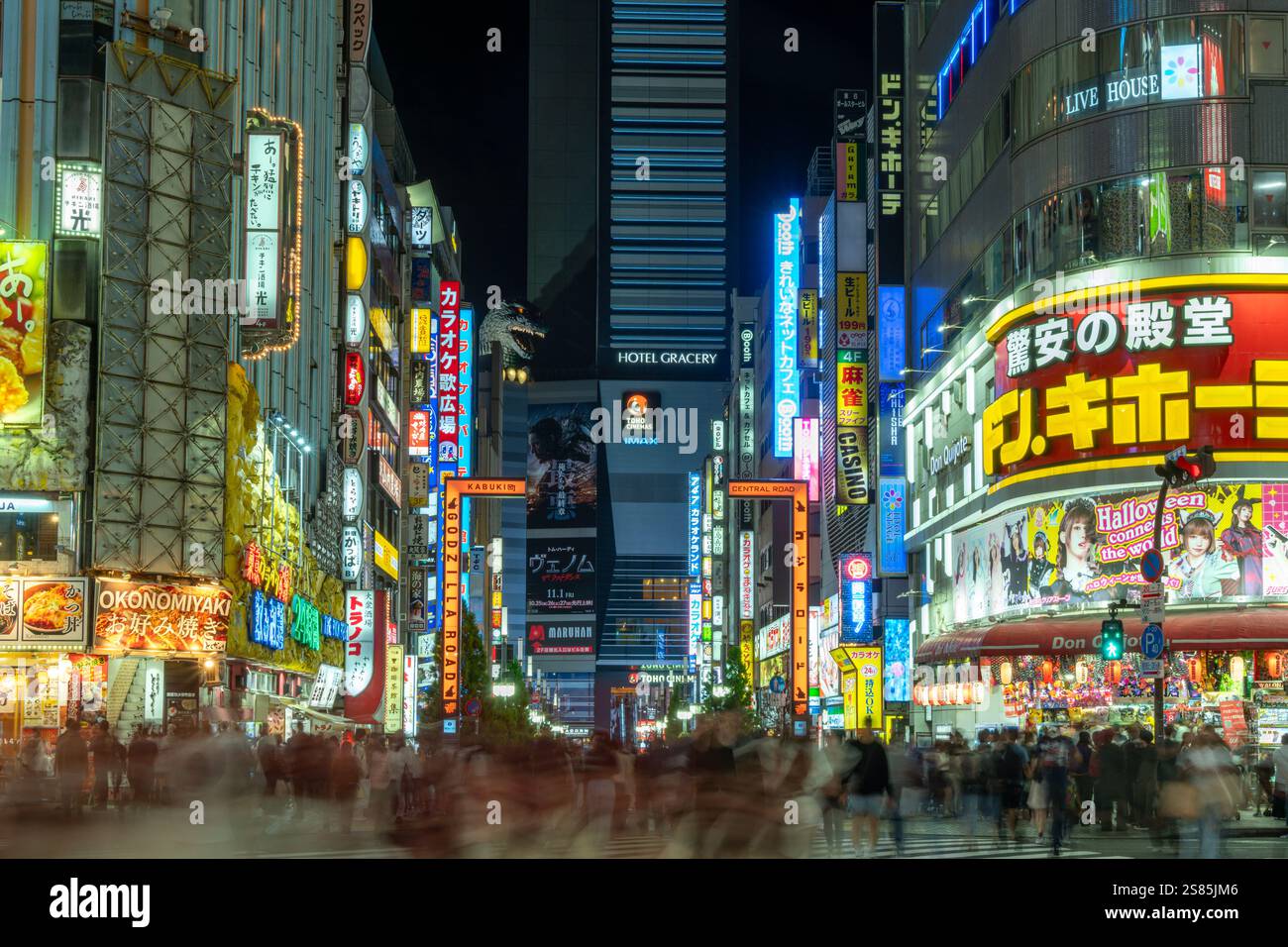 View of Godzilla's head and Kabukicho neon lit street at night ...