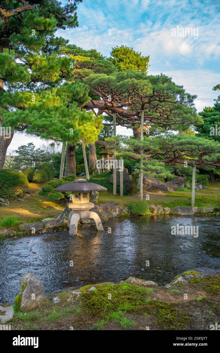 View of Japanese stone lantern and pagoda in Kenrokumachi Japanese ...