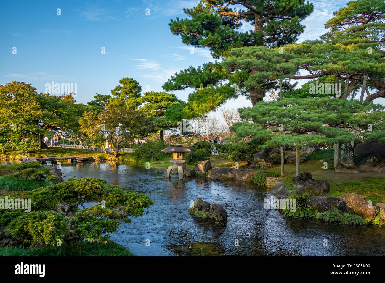 View of Japanese stone lantern in Kenrokumachi Japanese Garden ...