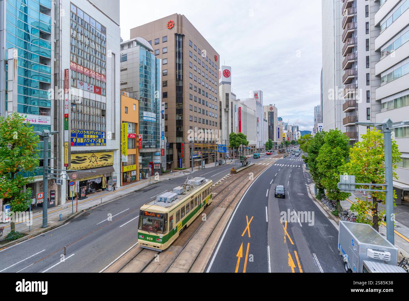 Elevated view of traffic and tram on major street during daytime ...