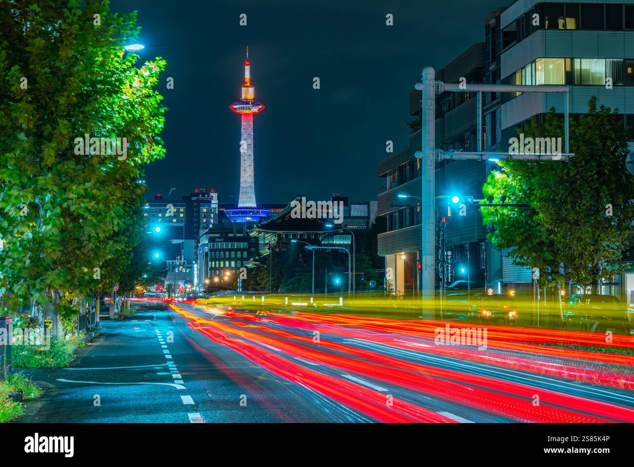 View of Nidec Kyoto Tower and trail lights at night, Shimogyo Ward ...
