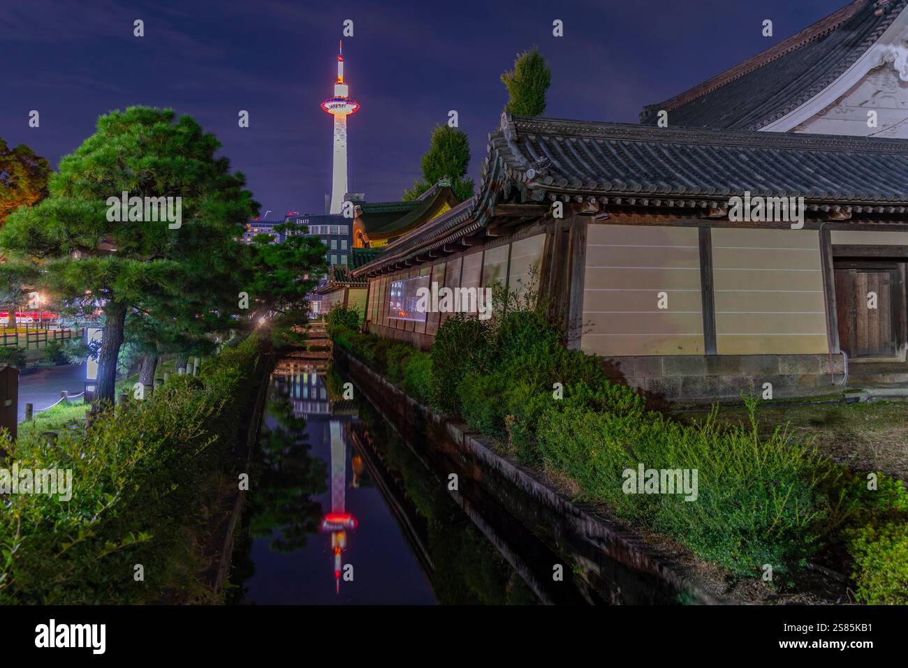 View of Nidec Kyoto Tower from Higashi Hongan-ji Temple at night ...