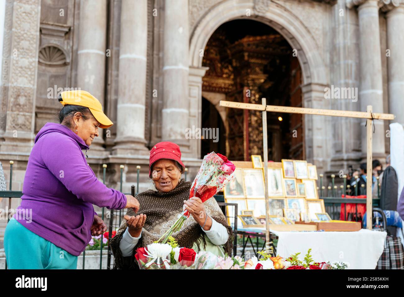 Flower vendor outside church, Quito, Ecuador Stock Photo - Alamy