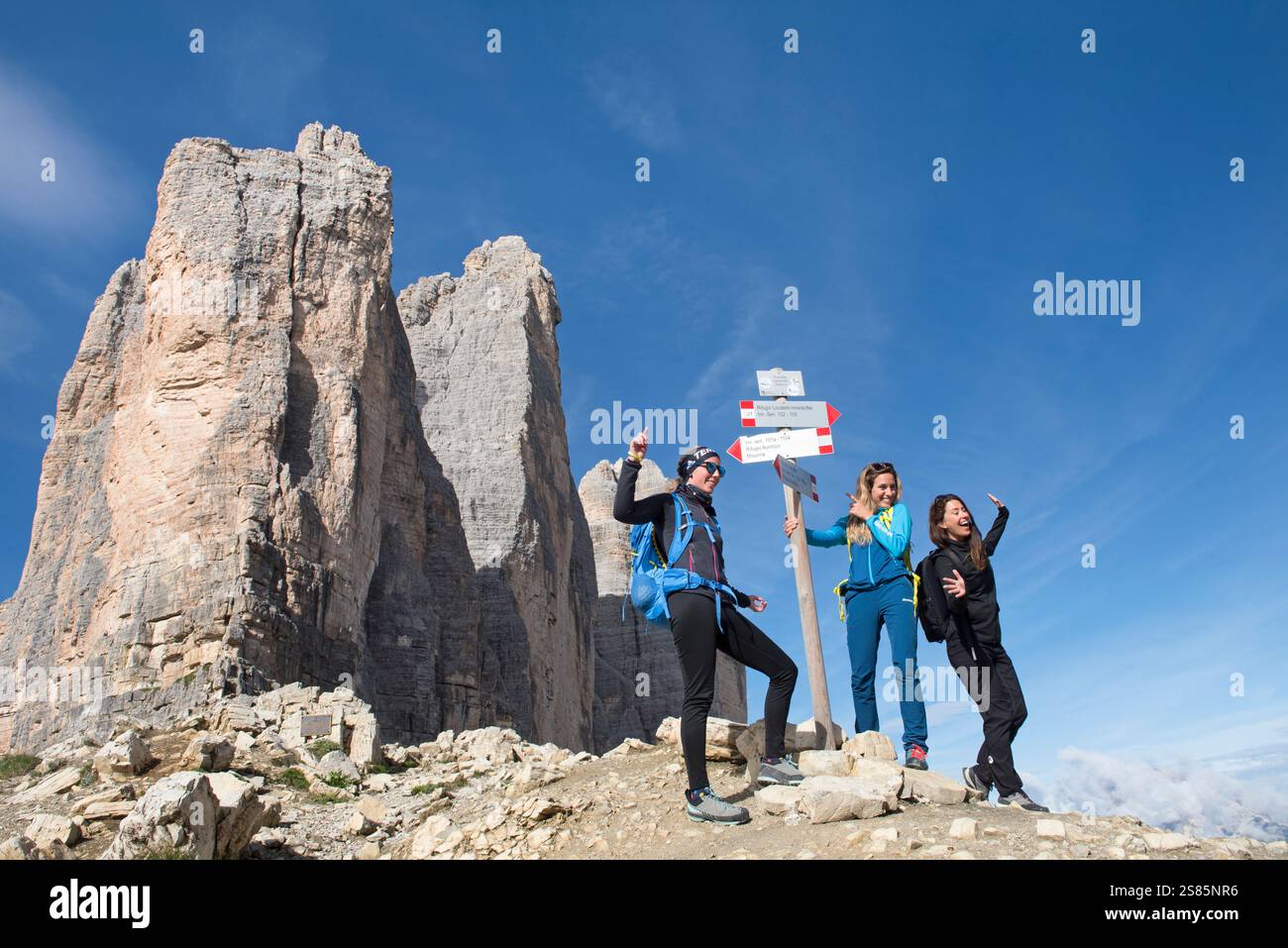 Hikers taking selfies at foot of Tre Cime di Lavaredo (Three Peaks of ...